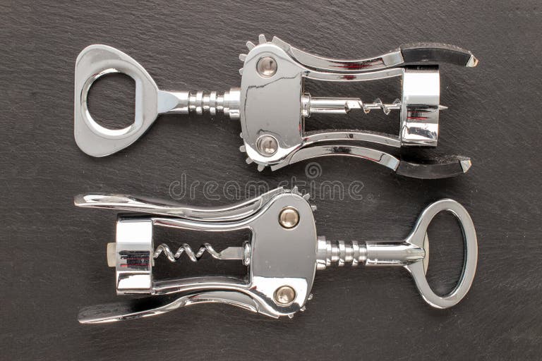 Metal Corkscrew on Slate Stone, Macro, Top View. a Corkscrew is a ...