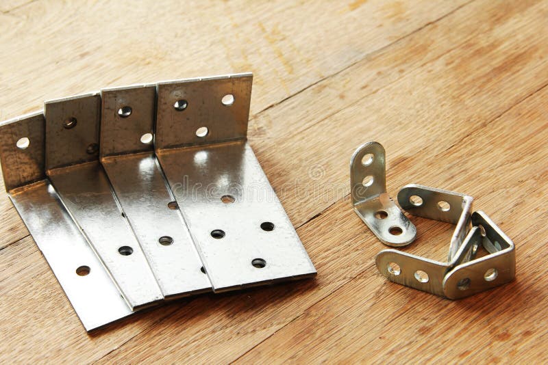 Metal Corners and Plates. Fastening Elements. Stock Photo - Image of ...