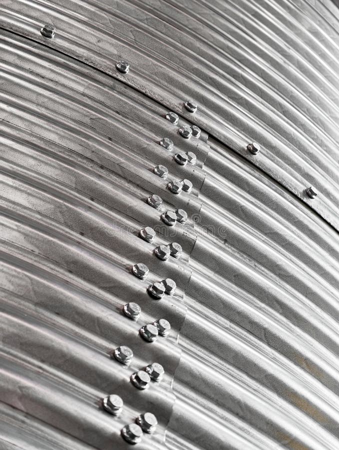 Metal Curves Glint Under Soft Light, Showcasing Intricate Rivets on a ...