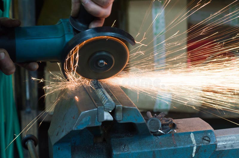 Metal Cutting with a Grinding Machine with Sparks. Stock Image - Image ...