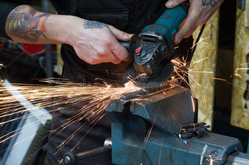 Metal cutting by grinder stock image. Image of equipment - 150230661
