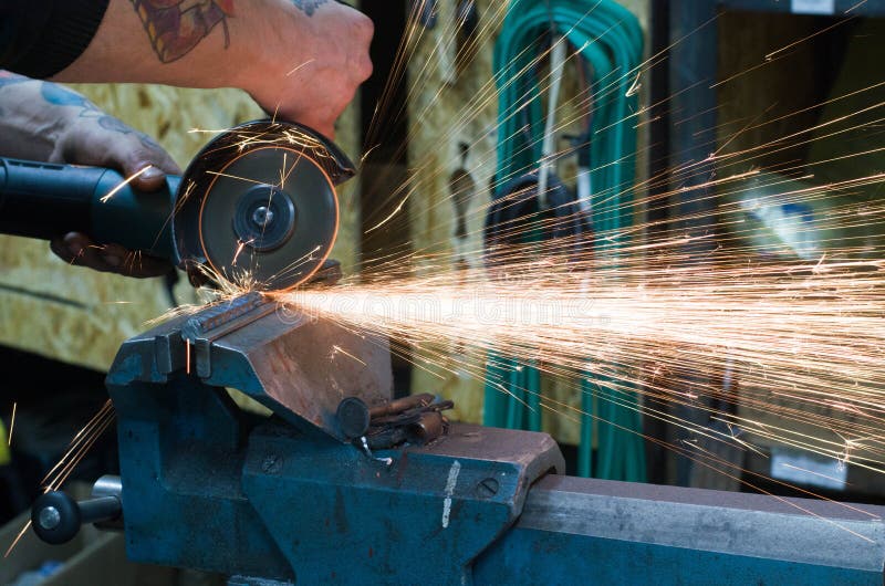 Metal cutting by grinder stock image. Image of equipment - 150230687