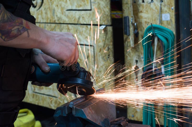 Metal cutting by grinder stock photo. Image of electric - 150231044