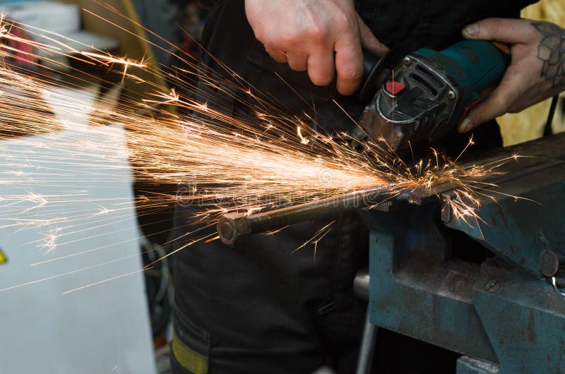 Metal Cutting with a Grinding Machine with Sparks. Stock Image - Image ...