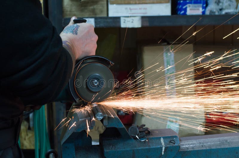 Metal cutting by grinder stock photo. Image of flash - 150231618