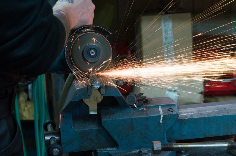 Metal cutting by grinder stock image. Image of grinder - 150232683