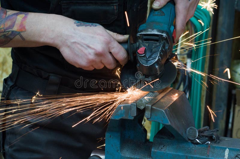 Metal Cutting with a Grinding Machine with Sparks. Stock Image - Image ...