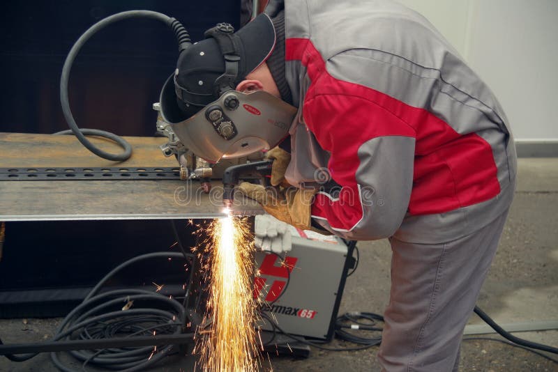 Metal Cutting Machine Used by a Worker Man Editorial Stock Image ...