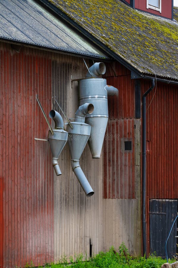 Metal Cyclone Separators Mounted on a Barn Wall.. Stock Photo - Image ...