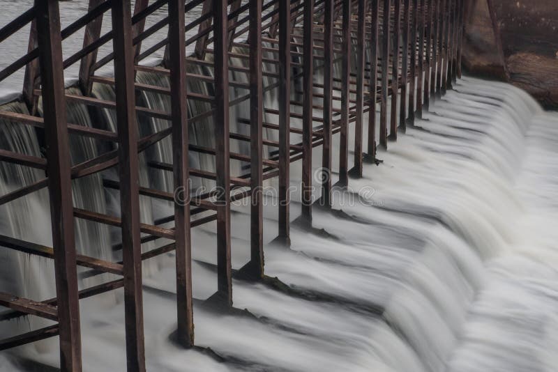 Metal dam and waterfall stock image. Image of hydro - 135179309