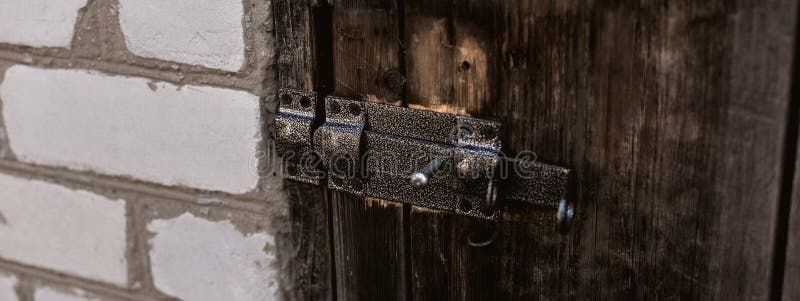 Metal Deadbolt on an Old Wooden Door Stock Photo - Image of design ...