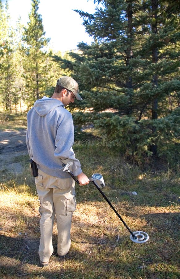 Metal Detecting stock image. Image of summer, young, foresty - 4004767
