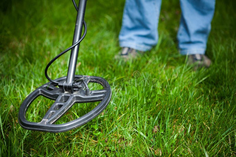 Metal detector in action stock image. Image of adventure - 41594975
