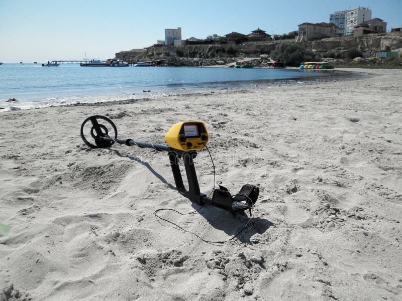 Metal Detector on the Beach Stock Photo - Image of hunting, seeking ...