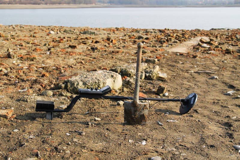 Metal detector and shovel stock photo. Image of environment - 68579056
