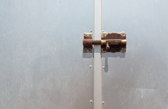 Metal Door Rusty Bolt stock photo. Image of fastening - 44431276