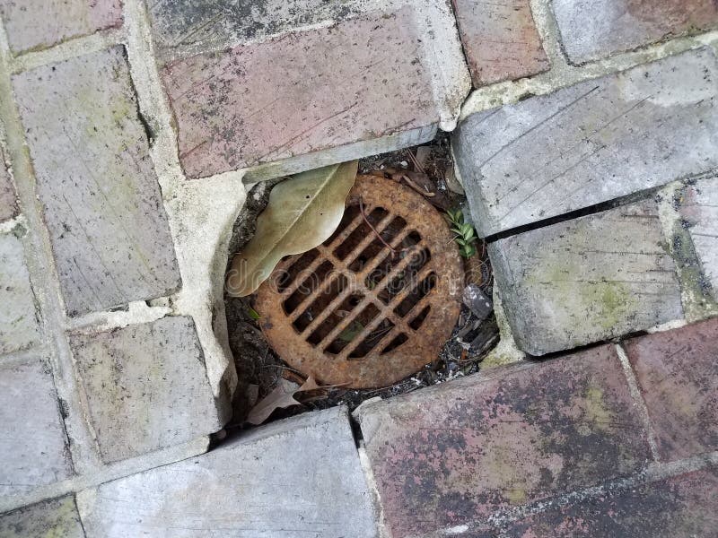 Metal Drain and Red and Grey Bricks or Masonry Stock Image - Image of ...