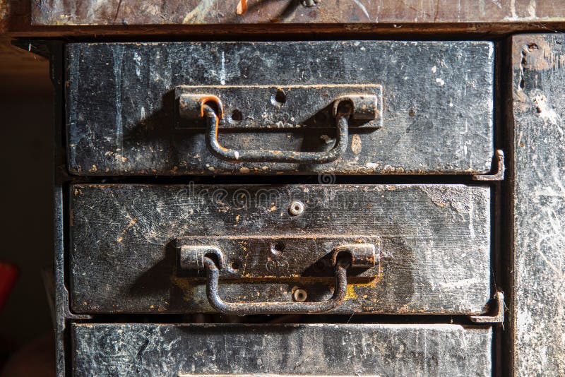 Metal Drawers on Rustic Cabinet Stock Image - Image of brown, antique ...