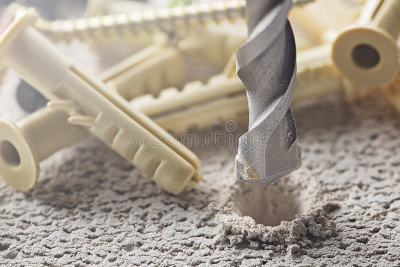 Metal Drill Bit Make Holes in Concrete Wall with Plastic Dowel, Wall ...
