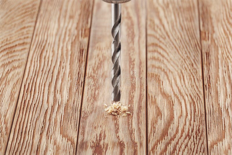 Metal Drill Bit Make Holes in a Wooden Board with Expressive Texture ...