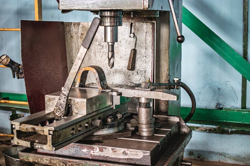 Metal Drilling Machine in an Industrial Workshop, Showcasing Precision ...
