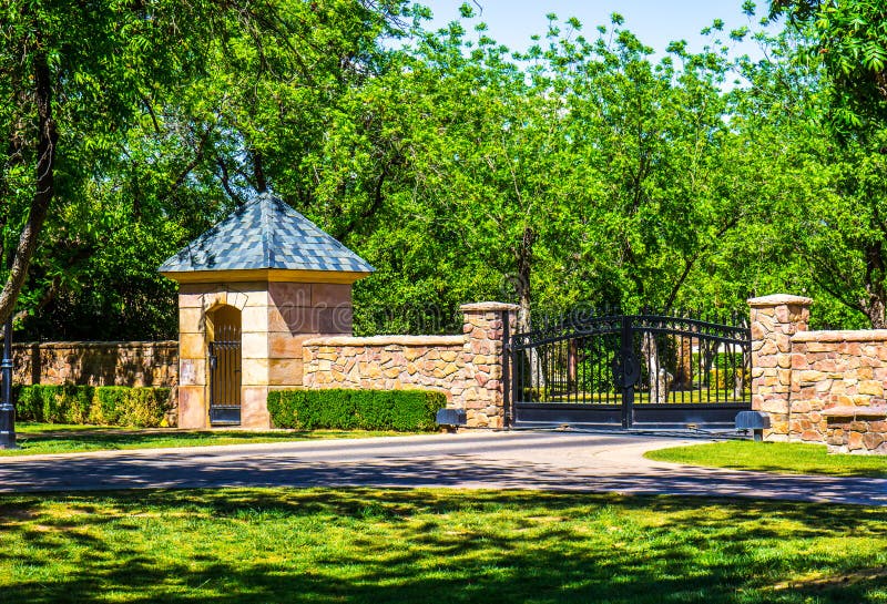 Metal Electric Access/Exit Gates with Walk through Gate House Stock ...