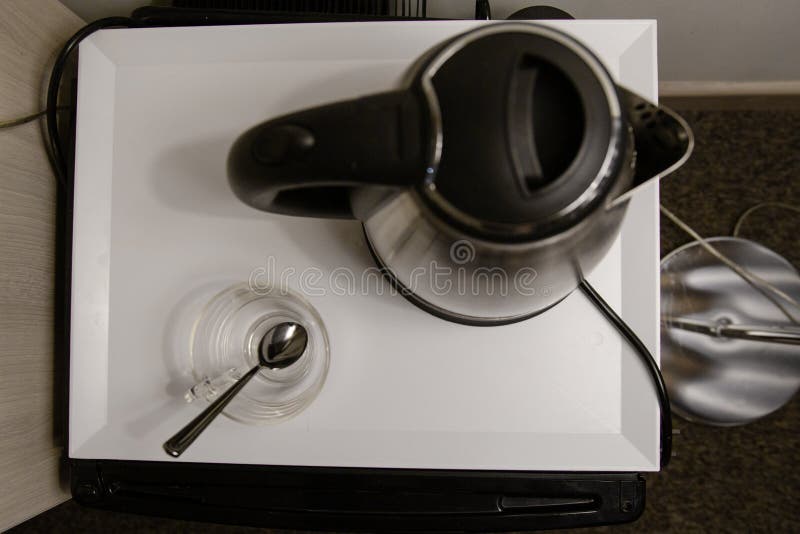 Metal Electric Kettle and Tea Cup Stock Image - Image of teapot, water ...