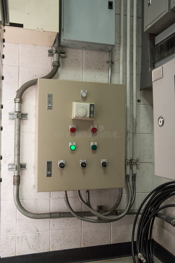 Metal Electricity Control Box with Sign on the Wall Stock Image - Image ...