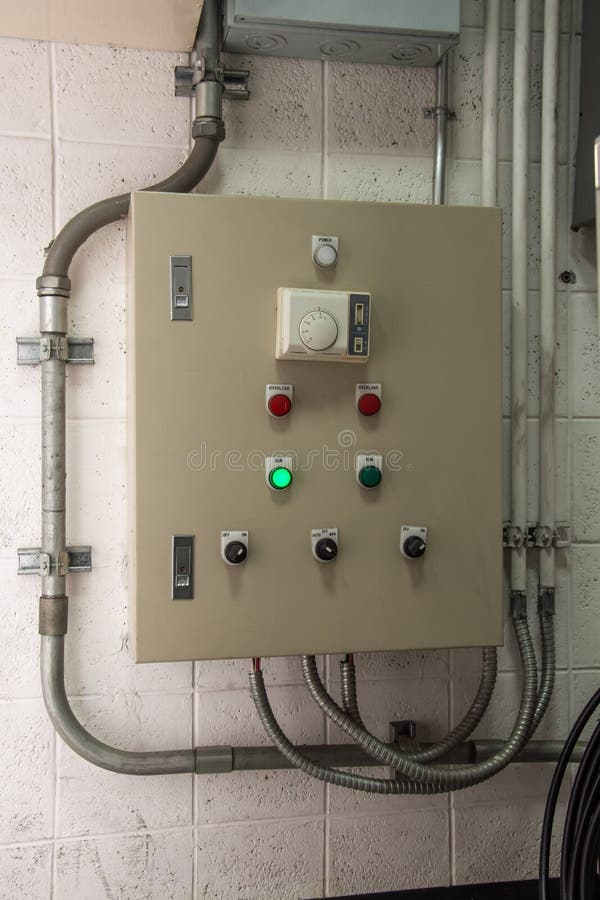 Metal Electricity Control Box with Sign on the Wall Stock Photo - Image ...