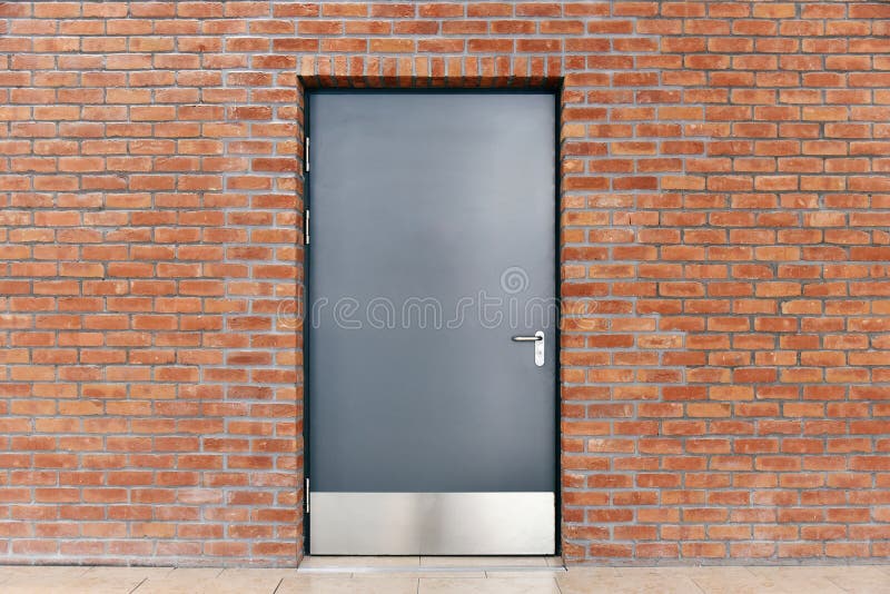 Metal Entrance Door in Brick Wall Stock Photo - Image of front ...