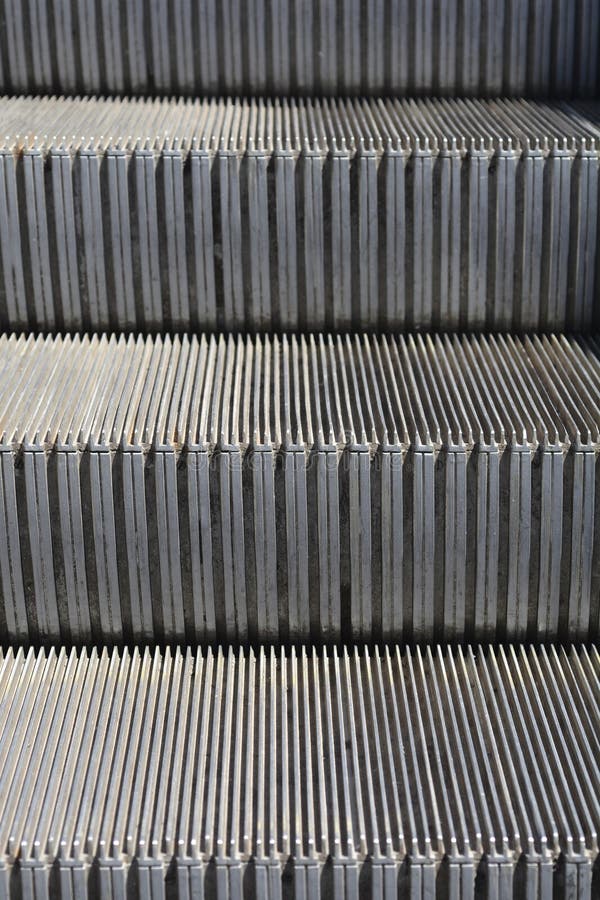Metal escalator steps stock image. Image of cropped - 385155003