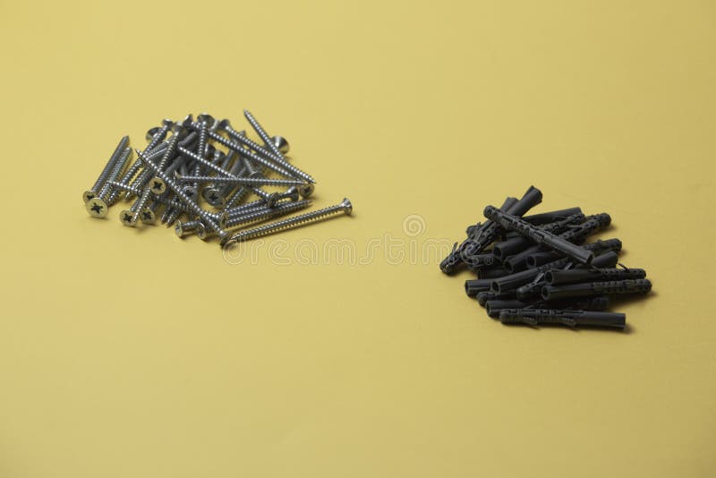 Metal Fasteners on a Yellow Background Stock Photo - Image of shiny ...