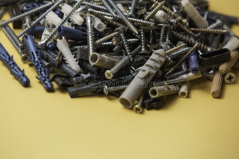 Metal Fasteners on a Yellow Background Stock Photo - Image of rivets ...