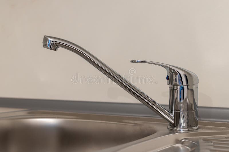 Metal Faucet Sink in Modern Kitchen. New Home Interior Stock Image ...