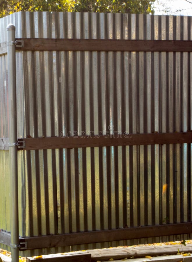 View of a Metal Fence stock photo. Image of yard, metal - 259122120