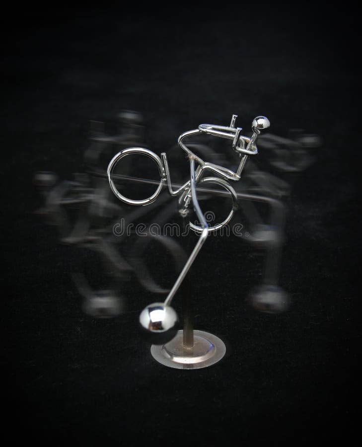 Metal Figure Riding a Bicycle Stock Photo - Image of balance, moving ...