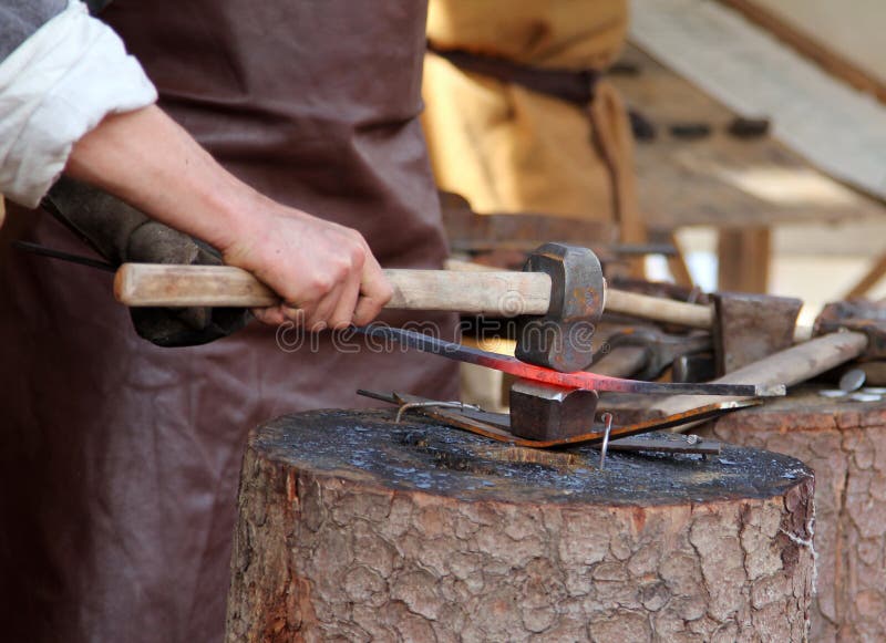 Metal forging process stock photo. Image of hammer, beat - 85833462