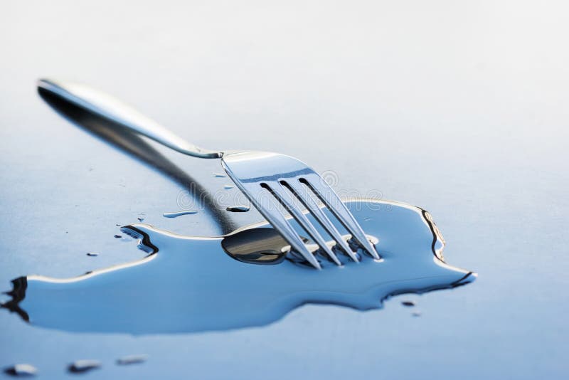 Metal Fork on a Large Water Drop on a Clean Surface Stock Image - Image ...