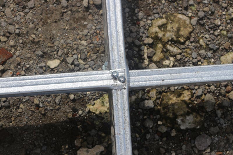 Metal Framework on Gravelly Surface Close-Up Stock Image - Image of ...