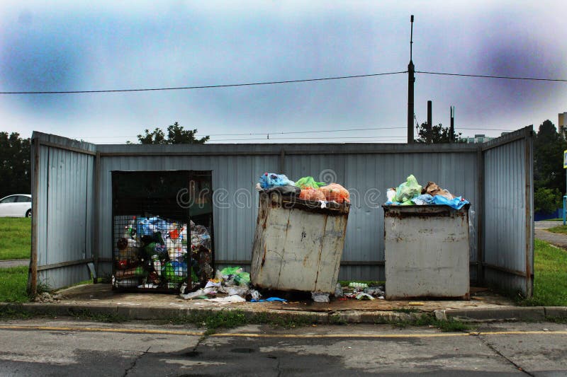 Metal Garbage Cans are Filled To the Brim with Garbage. the Problem of ...