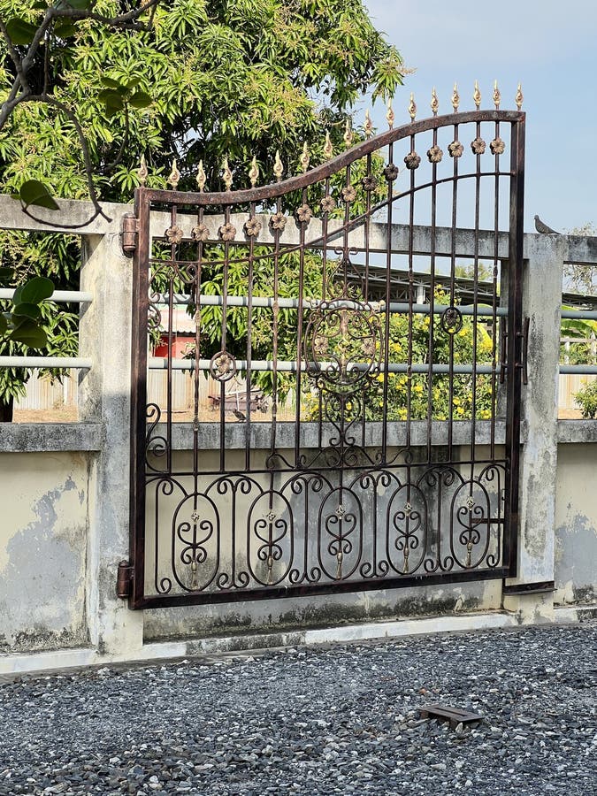 929 Iron Gate Concrete Fence Stock Photos - Free & Royalty-Free Stock ...