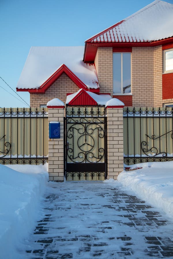 Metal Gate at the Fence in the Snow. Stock Image - Image of modern ...