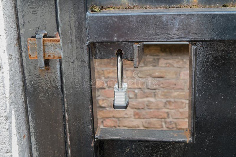 Metal Gate Locked and Secured by Padlock Stock Photo - Image of locked ...