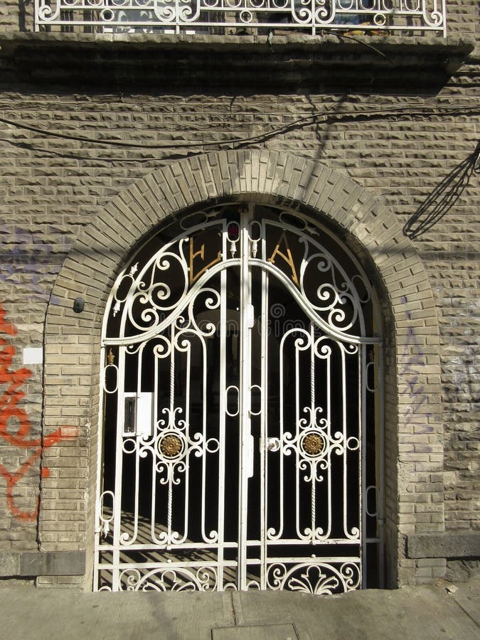Metal Gate in Mexico City stock photo. Image of brick - 137003404