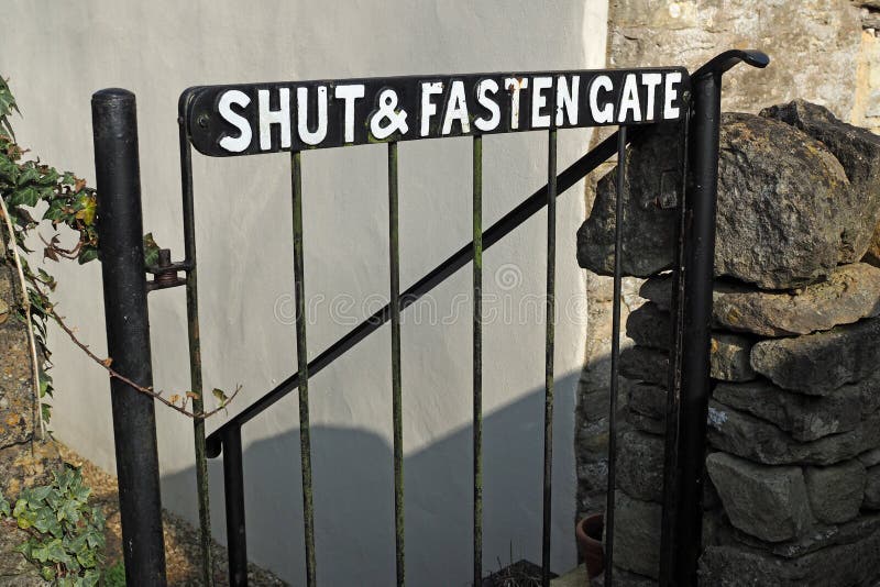 Metal Gate with Shut and Fasten Gate Text Stock Image - Image of ...