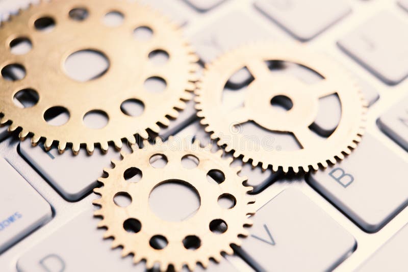 Metal Gear Wheels on a Computer Keyboard Stock Image - Image of wheels ...