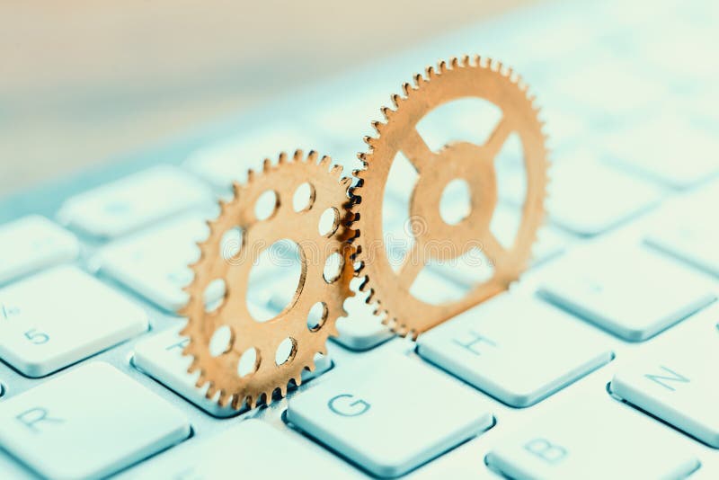 Metal Gear Wheels on a Computer Keyboard Stock Image - Image of ...