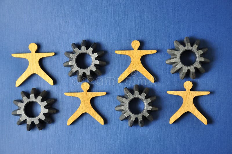 Metal Gears and a Figure of a Man Made of Wood Stock Image - Image of ...