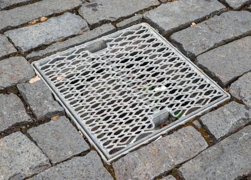 Metal Grid From A Manhole Cover Stock Photo - Image of design ...