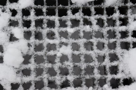 Metal grid covered by snow stock photo. Image of metal - 176812876
